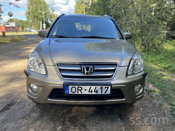 Brown Honda CR-V 2006 in Valmiera, with an engine capacity of 2.00 L and mileage of 340 thousand km for 2350 €, photo 8 on AUTOMOTO.COM.LV