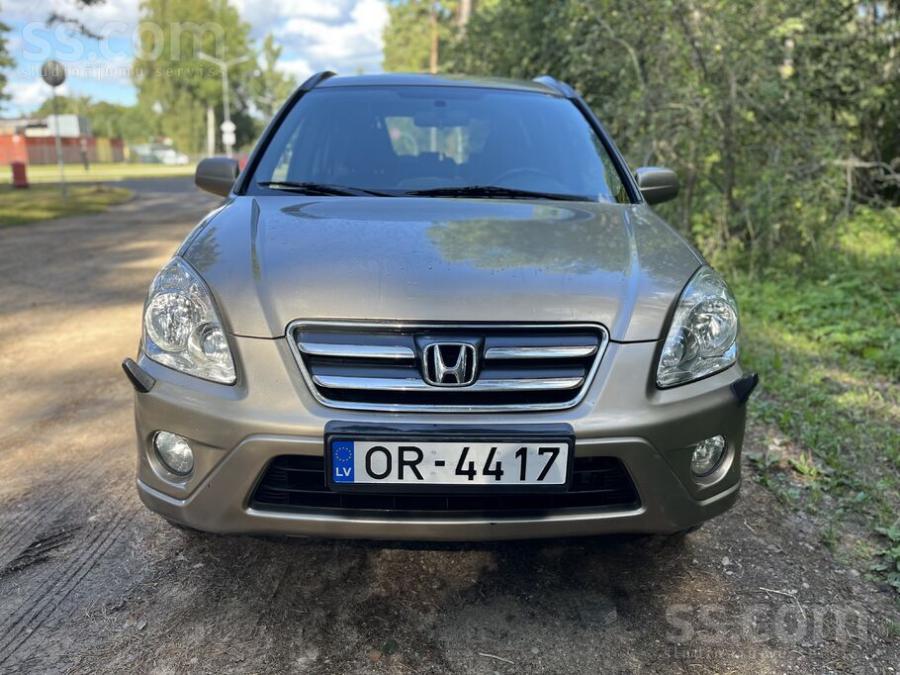 Brown Honda CR-V 2006 in Valmiera, with an engine capacity of 2.00 L and mileage of 340 thousand km for 2350 €, photo 8 on AUTOMOTO.COM.LV