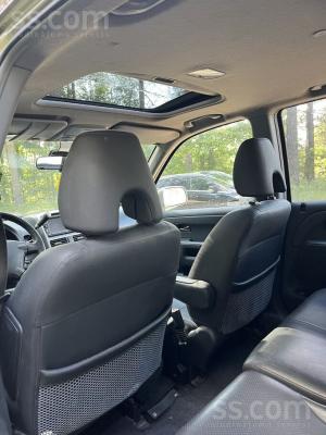 Brown Honda CR-V 2006 in Valmiera, with an engine capacity of 2.00 L and mileage of 340 thousand km for 2350 €, photo 11 on AUTOMOTO.COM.LV