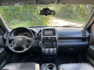 Brown Honda CR-V 2006 in Valmiera, with an engine capacity of 2.00 L and mileage of 340 thousand km for 2350 €, photo 12 on AUTOMOTO.COM.LV