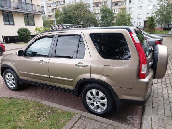 Brūns Honda CR-V 2006 Rīga, ar dzinēja tilpumu 2.00 L un nobraukumu 228 tūkst. km par 1850 €, foto 3 vietnē AUTOMOTO.COM.LV
