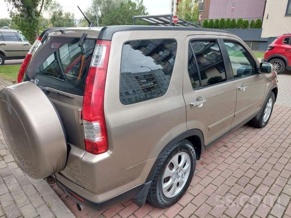 Brūns Honda CR-V 2006 Rīga, ar dzinēja tilpumu 2.00 L un nobraukumu 228 tūkst. km par 1850 €, foto 4 vietnē AUTOMOTO.COM.LV