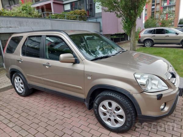 Brūns Honda CR-V 2006 Rīga, ar dzinēja tilpumu 2.00 L un nobraukumu 228 tūkst. km par 1850 €, foto 5 vietnē AUTOMOTO.COM.LV