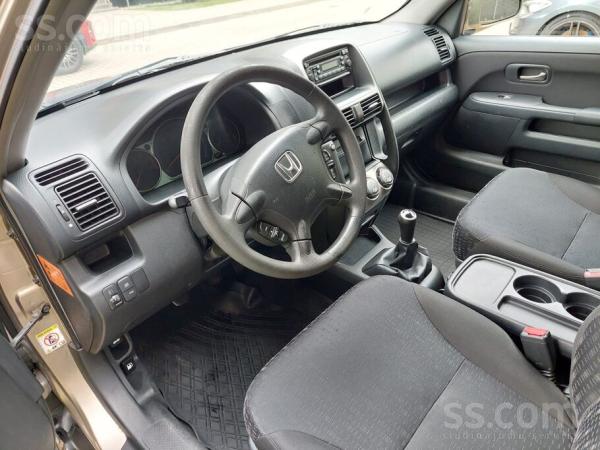 Brūns Honda CR-V 2006 Rīga, ar dzinēja tilpumu 2.00 L un nobraukumu 228 tūkst. km par 1850 €, foto 6 vietnē AUTOMOTO.COM.LV