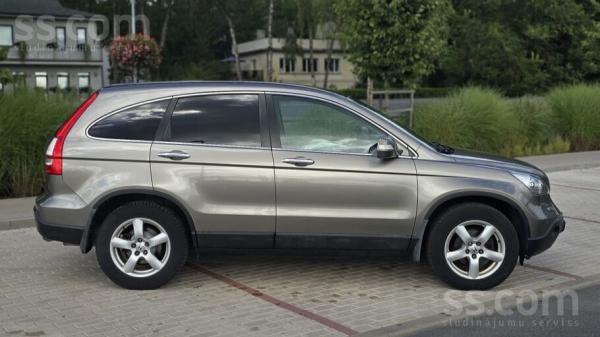 Brown Honda CR-V 2008 in Jurmala, with an engine capacity of 2.20 L and mileage of 265 thousand km for 6500 €, photo 4 on AUTOMOTO.COM.LV