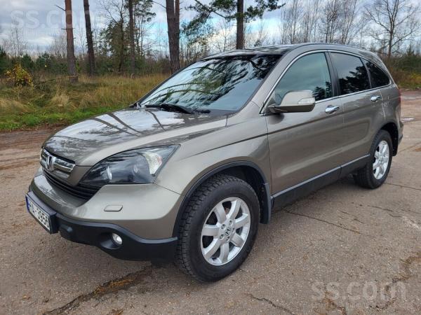 Brown Honda CR-V 2008 in Riga, with an engine capacity of 2.00 L and mileage of 268 thousand km for 6700 €, photo 4 on AUTOMOTO.COM.LV