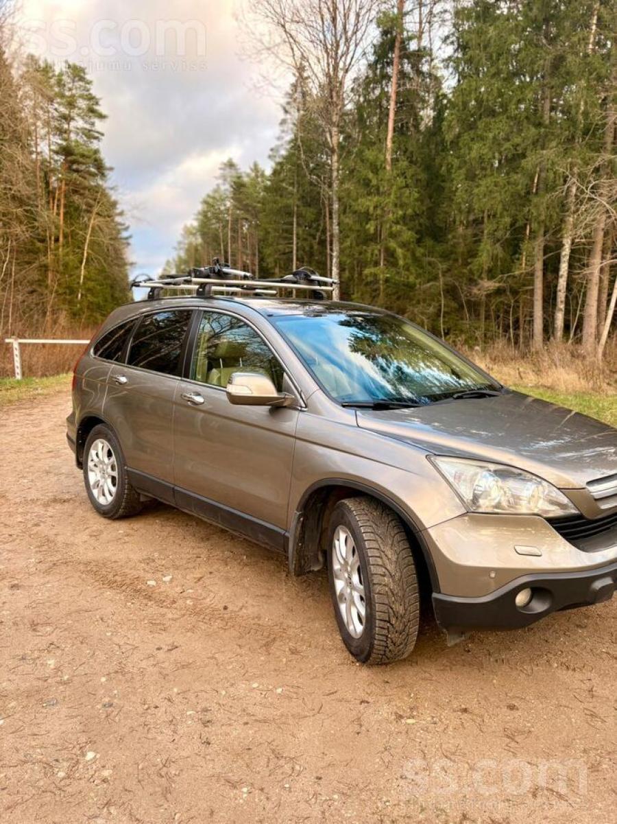 Brown Honda CR-V 2008 in Riga, with an engine capacity of 2.20 L and mileage of 315 thousand km for 6500 €, photo 4 on AUTOMOTO.COM.LV
