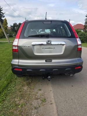 Brown Honda CR-V 2008 in Siauliai, with an engine capacity of 2.20 L and mileage of 270 thousand km for 3999 €, photo 5 on AUTOMOTO.COM.LV