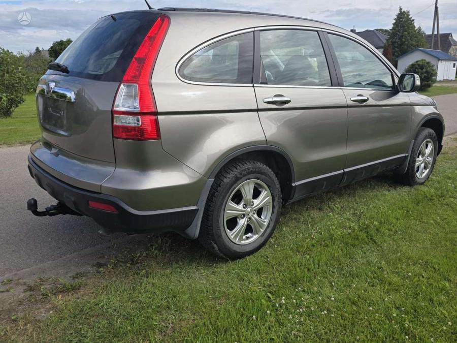 Brown Honda CR-V 2008 in Siauliai, with an engine capacity of 2.20 L and mileage of 270 thousand km for 3999 €, photo 6 on AUTOMOTO.COM.LV