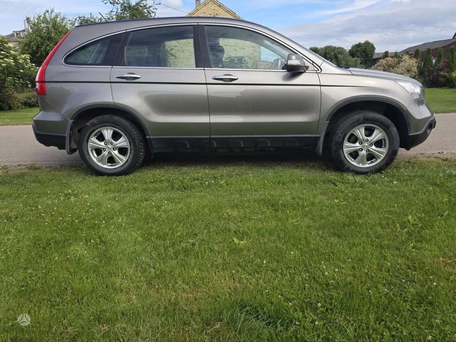 Brown Honda CR-V 2008 in Siauliai, with an engine capacity of 2.20 L and mileage of 270 thousand km for 3999 €, photo 7 on AUTOMOTO.COM.LV