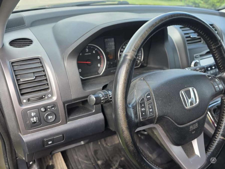 Brown Honda CR-V 2008 in Siauliai, with an engine capacity of 2.20 L and mileage of 270 thousand km for 3999 €, photo 12 on AUTOMOTO.COM.LV