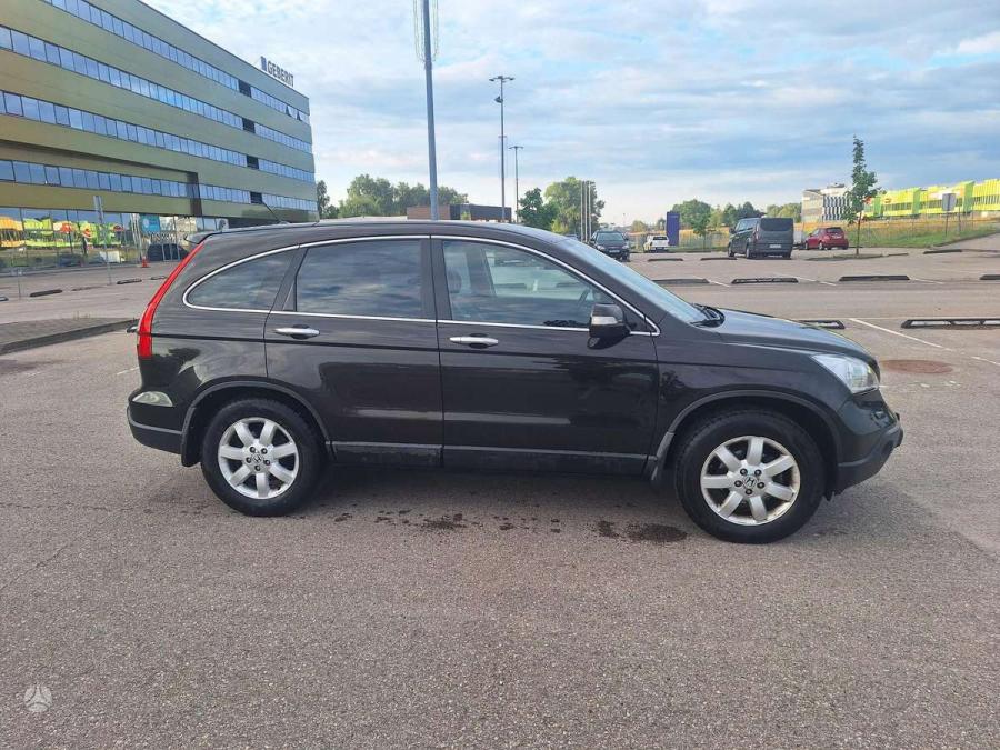 Brown Honda CR-V 2008 in Vilnius, with an engine capacity of 2.00 L and mileage of 256 thousand km for 3900 €, photo 6 on AUTOMOTO.COM.LV