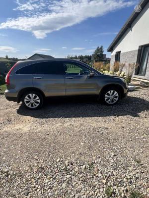 Brown Honda CR-V 2008 in Vilnius, with an engine capacity of 2.20 L and mileage of 278 thousand km for 5300 €, photo 4 on AUTOMOTO.COM.LV