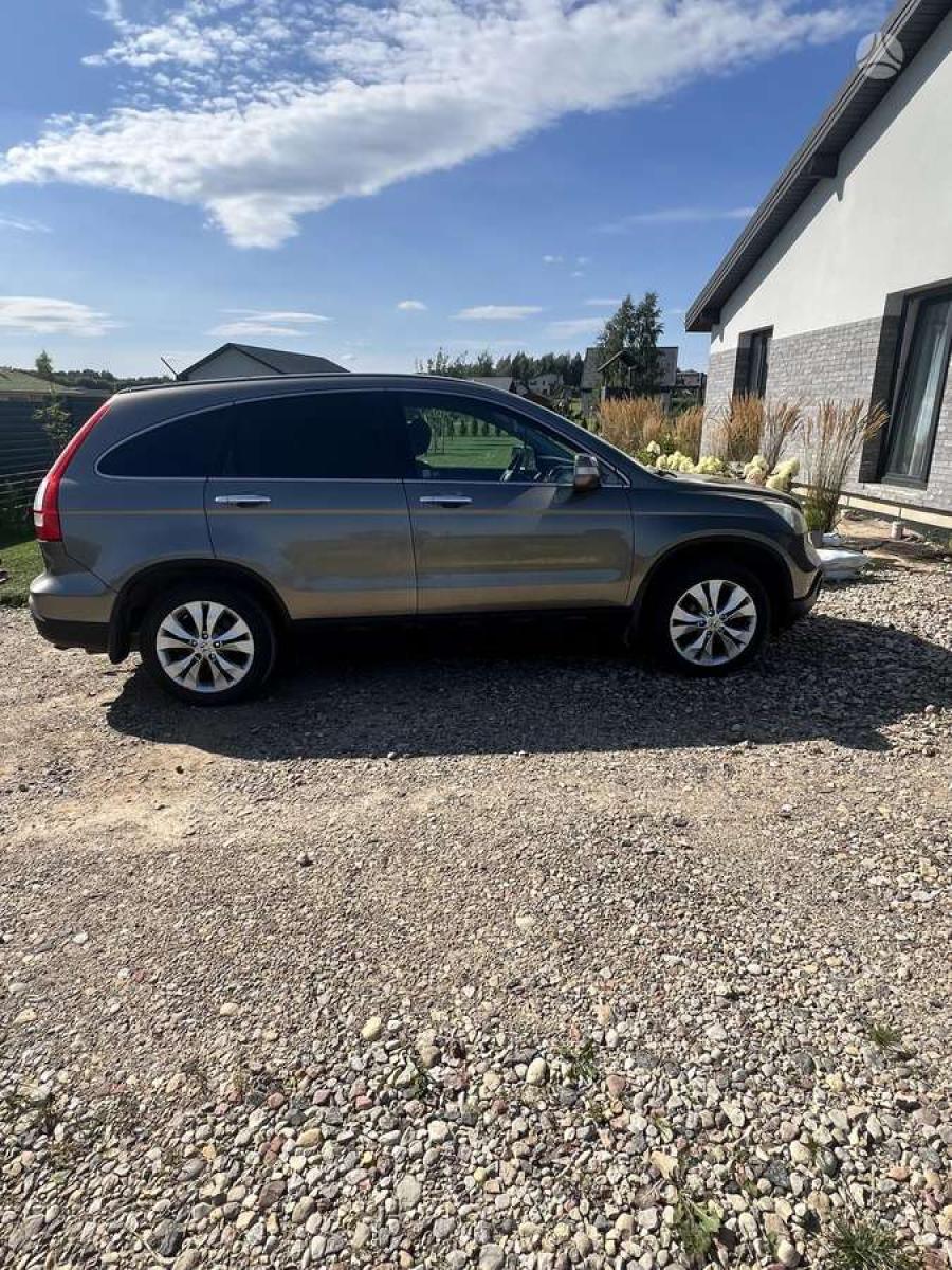 Brown Honda CR-V 2008 in Vilnius, with an engine capacity of 2.20 L and mileage of 278 thousand km for 5300 €, photo 4 on AUTOMOTO.COM.LV