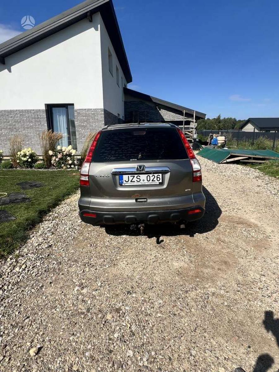 Brown Honda CR-V 2008 in Vilnius, with an engine capacity of 2.20 L and mileage of 278 thousand km for 5300 €, photo 5 on AUTOMOTO.COM.LV
