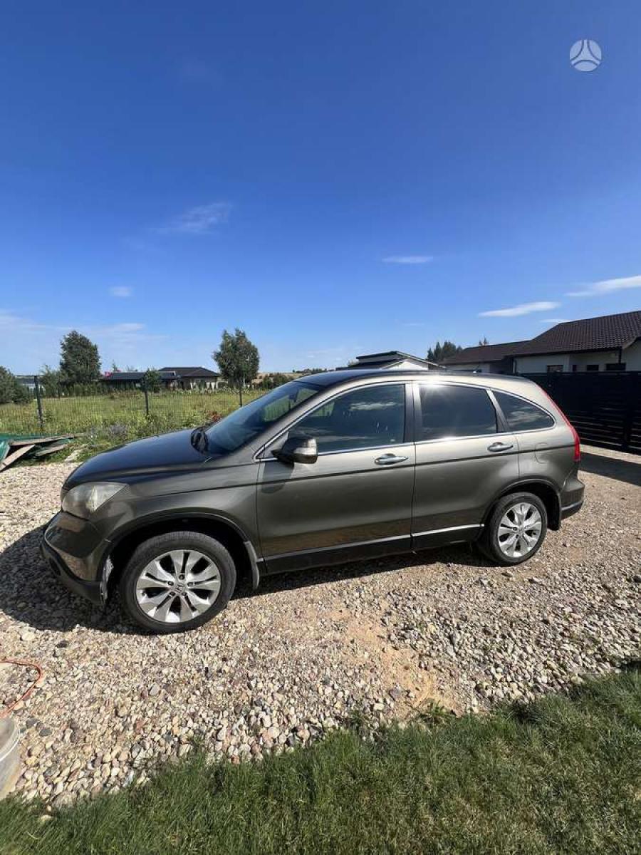 Brown Honda CR-V 2008 in Vilnius, with an engine capacity of 2.20 L and mileage of 278 thousand km for 5300 €, photo 6 on AUTOMOTO.COM.LV
