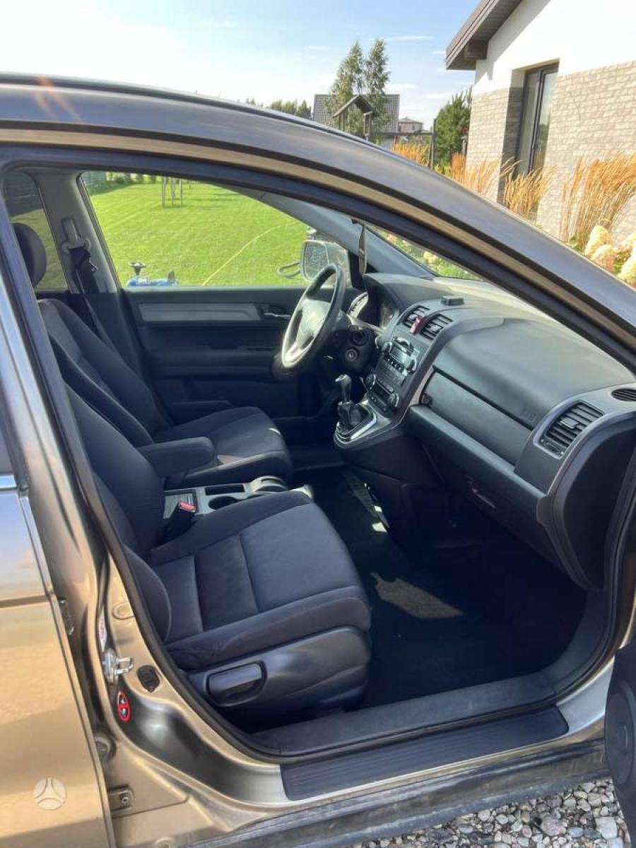 Brown Honda CR-V 2008 in Vilnius, with an engine capacity of 2.20 L and mileage of 278 thousand km for 5300 €, photo 11 on AUTOMOTO.COM.LV