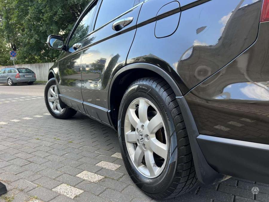 Brown Honda CR-V 2008 in Vilnius, with an engine capacity of 2.00 L and mileage of 256 thousand km for 4650 €, photo 24 on AUTOMOTO.COM.LV