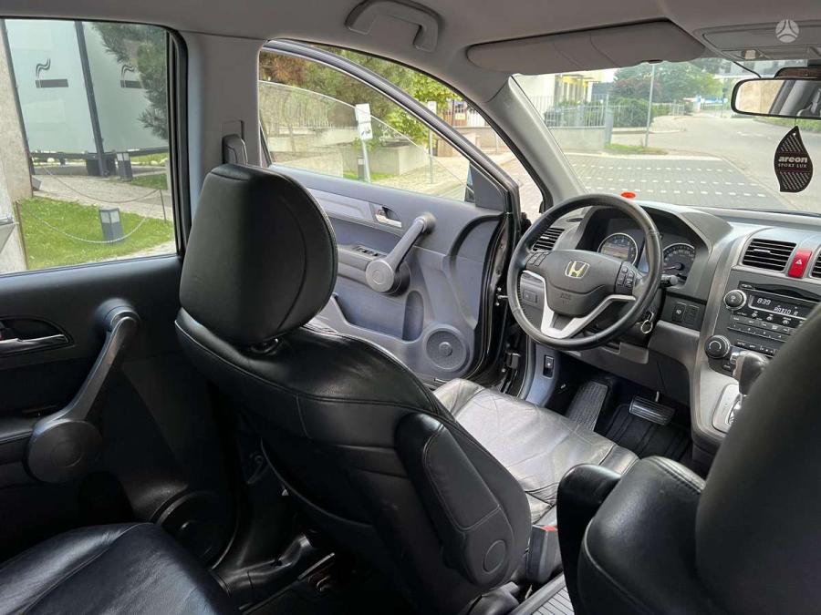 Brown Honda CR-V 2008 in Vilnius, with an engine capacity of 2.00 L and mileage of 256 thousand km for 4650 €, photo 39 on AUTOMOTO.COM.LV