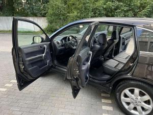Brown Honda CR-V 2008 in Vilnius, with an engine capacity of 2.00 L and mileage of 256 thousand km for 4650 €, photo 51 on AUTOMOTO.COM.LV