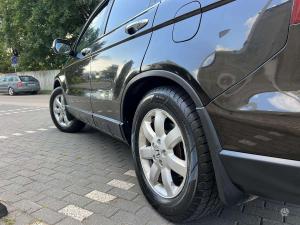 Brown Honda CR-V 2008 in Vilnius, with an engine capacity of 2.00 L and mileage of 256 thousand km for 4650 €, photo 24 on AUTOMOTO.COM.LV