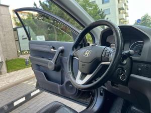 Brown Honda CR-V 2008 in Vilnius, with an engine capacity of 2.00 L and mileage of 256 thousand km for 4650 €, photo 32 on AUTOMOTO.COM.LV