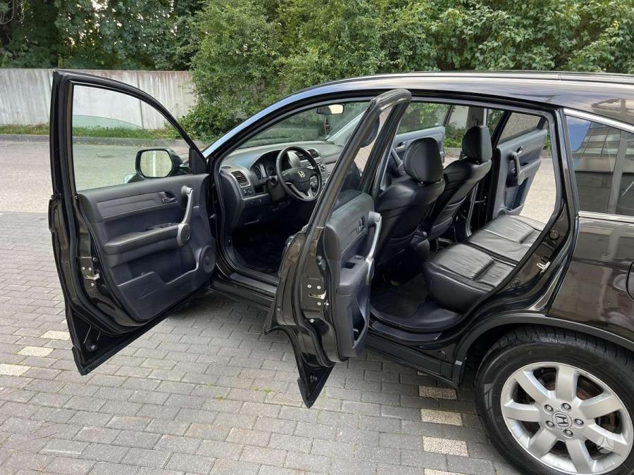 Brown Honda CR-V 2008 in Vilnius, with an engine capacity of 2.00 L and mileage of 256 thousand km for 4650 €, photo 51 on AUTOMOTO.COM.LV