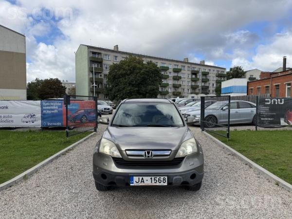 Brown Honda CR-V 2008 in Ventspils, with an engine capacity of 2.20 L and mileage of 394 thousand km for 1500 €, photo 3 on AUTOMOTO.COM.LV