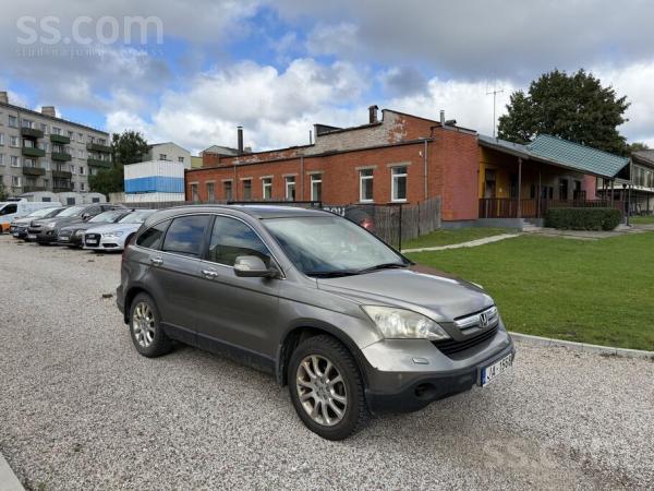 Brown Honda CR-V 2008 in Ventspils, with an engine capacity of 2.20 L and mileage of 394 thousand km for 1500 €, photo 4 on AUTOMOTO.COM.LV