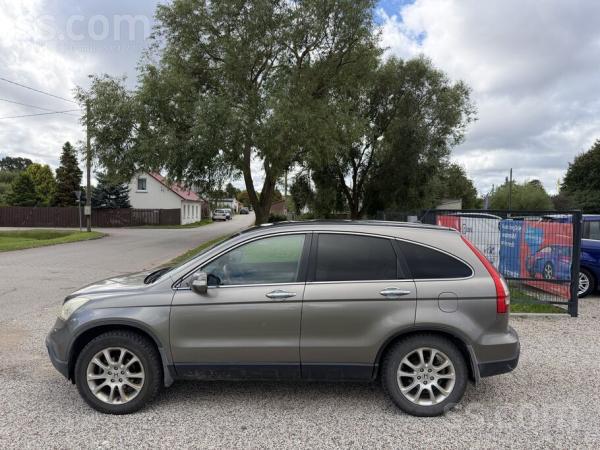 Brown Honda CR-V 2008 in Ventspils, with an engine capacity of 2.20 L and mileage of 394 thousand km for 1500 €, photo 6 on AUTOMOTO.COM.LV