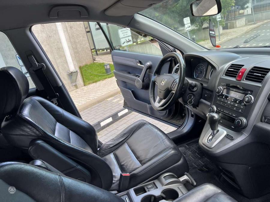 Brown Honda CR-V 2008 in Vilnius, with an engine capacity of 2.00 L and mileage of 255 thousand km for 4950 €, photo 37 on AUTOMOTO.COM.LV
