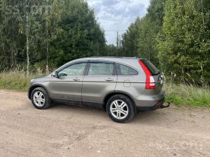 Brown Honda CR-V 2008 in Valmiera, with an engine capacity of 2.00 L and mileage of 368 thousand km for 3777 €, photo 6 on AUTOMOTO.COM.LV