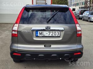 Brown Honda CR-V 2008 in Riga, with an engine capacity of 2.00 L and mileage of 250 thousand km for 4770 €, photo 7 on AUTOMOTO.COM.LV