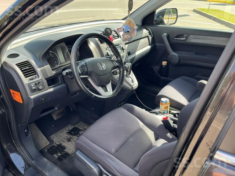 Brown Honda CR-V 2008 in Riga, with an engine capacity of 2.00 L and mileage of 207 thousand km for 4750 €, photo 6 on AUTOMOTO.COM.LV