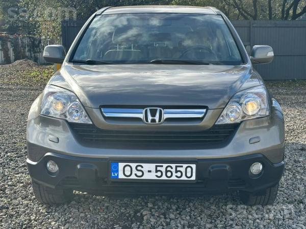 Brown Honda CR-V 2008 in Riga, with an engine capacity of 2.20 L and mileage of 369 thousand km for 3200 €, photo 9 on AUTOMOTO.COM.LV