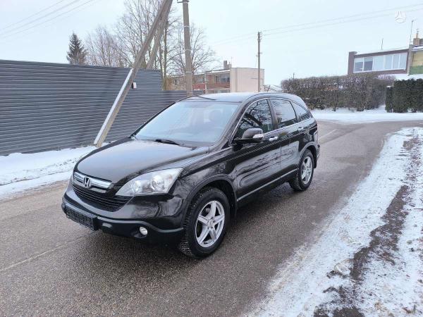 Brown Honda CR-V 2009 in Marijampole, with an engine capacity of 2.20 L and mileage of 298 thousand km for 4850 €, photo 1 on AUTOMOTO.COM.LV