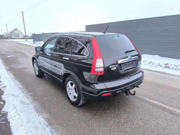 Brown Honda CR-V 2009 in Marijampole, with an engine capacity of 2.20 L and mileage of 298 thousand km for 4850 €, photo 3 on AUTOMOTO.COM.LV