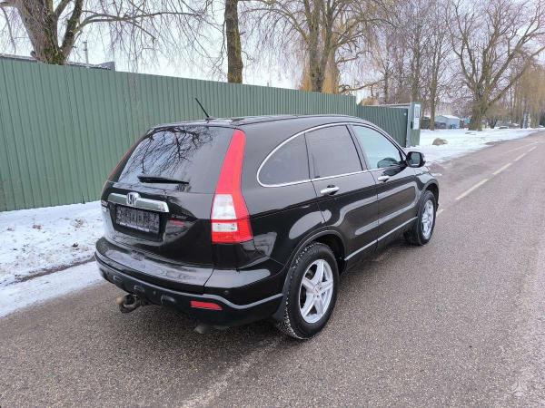 Brown Honda CR-V 2009 in Marijampole, with an engine capacity of 2.20 L and mileage of 298 thousand km for 4850 €, photo 5 on AUTOMOTO.COM.LV