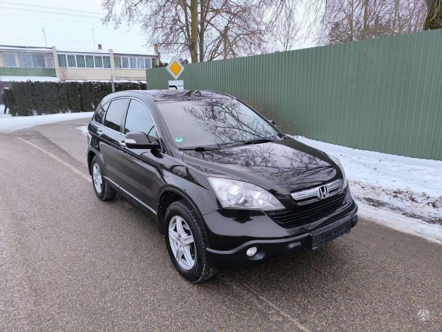 Brown Honda CR-V 2009 in Marijampole, with an engine capacity of 2.20 L and mileage of 298 thousand km for 4850 €, photo 7 on AUTOMOTO.COM.LV