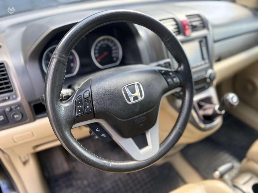 Brown Honda CR-V 2009 in Klaipeda, with an engine capacity of 2.20 L and mileage of 273 thousand km for 4900 €, photo 24 on AUTOMOTO.COM.LV
