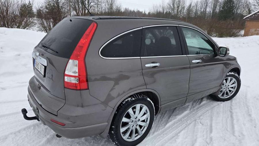 Brown Honda CR-V 2010 in Utena, with an engine capacity of 2.20 L and mileage of 287 thousand km for 6450 €, photo 3 on AUTOMOTO.COM.LV