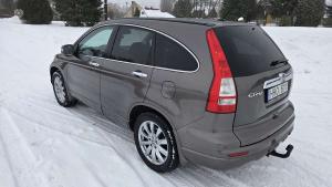Brown Honda CR-V 2010 in Utena, with an engine capacity of 2.20 L and mileage of 287 thousand km for 6450 €, photo 4 on AUTOMOTO.COM.LV