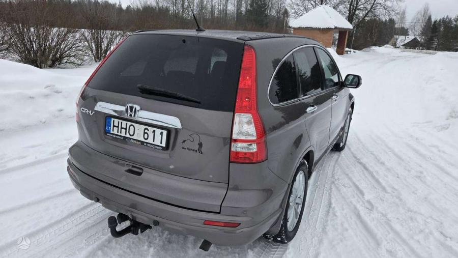 Brown Honda CR-V 2010 in Utena, with an engine capacity of 2.20 L and mileage of 287 thousand km for 6450 €, photo 6 on AUTOMOTO.COM.LV