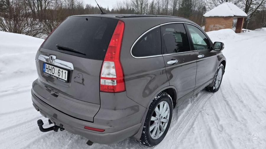 Brown Honda CR-V 2010 in Utena, with an engine capacity of 2.20 L and mileage of 287 thousand km for 6450 €, photo 7 on AUTOMOTO.COM.LV