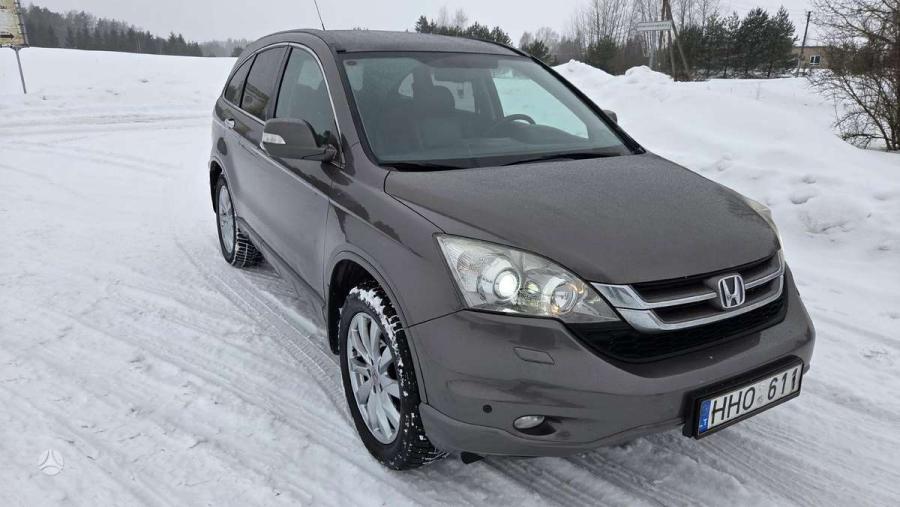 Brown Honda CR-V 2010 in Utena, with an engine capacity of 2.20 L and mileage of 287 thousand km for 6450 €, photo 11 on AUTOMOTO.COM.LV