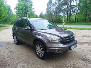 Brūns Honda CR-V 2010 Rīga, ar dzinēja tilpumu 2.20 L un nobraukumu 156 tūkst. km par 7700 €, foto  vietnē AUTOMOTO.COM.LV