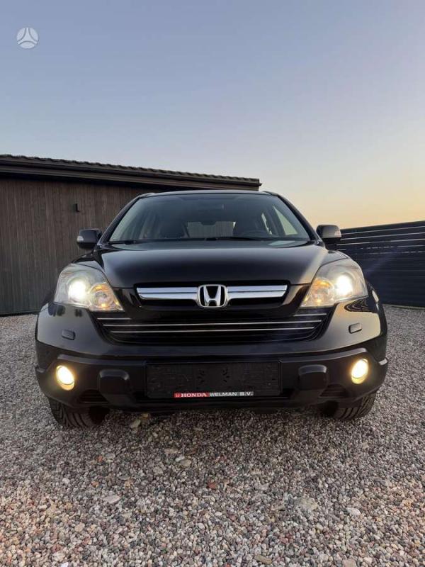 Brūns Honda CR-V 2010 Alīta, ar dzinēja tilpumu 2.35 L un nobraukumu 243 tūkst. km par 5999 €, foto 2 vietnē AUTOMOTO.COM.LV