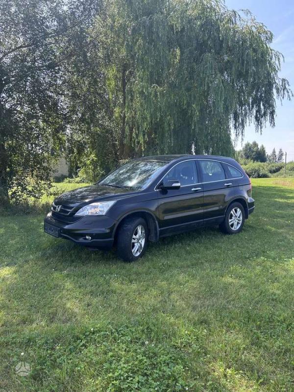 Brown Honda CR-V 2010 in Ukmerge, with an engine capacity of 2.20 L and mileage of 261 thousand km for 5600 €, photo 1 on AUTOMOTO.COM.LV