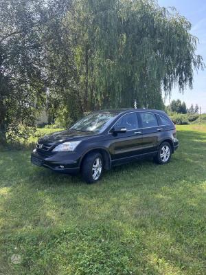 Brown Honda CR-V 2010 in Ukmerge, with an engine capacity of 2.20 L and mileage of 261 thousand km for 5600 €, photo  on AUTOMOTO.COM.LV