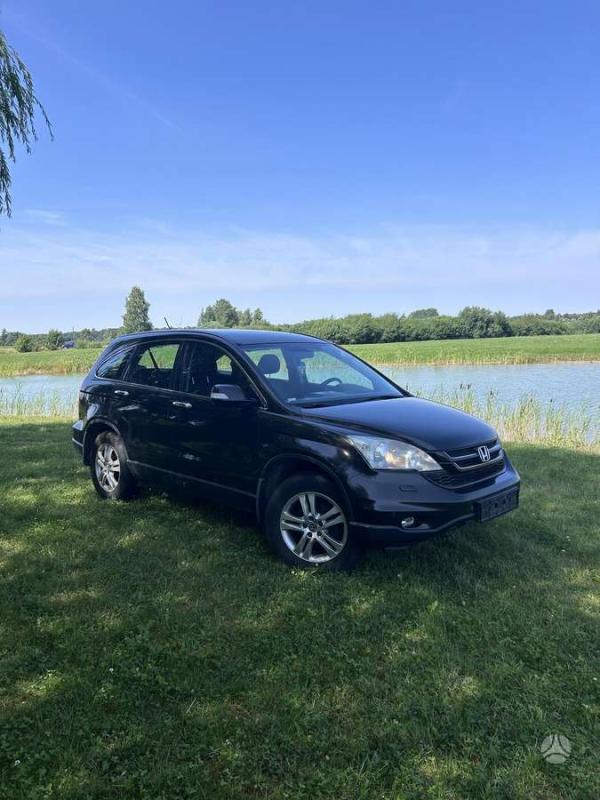 Brown Honda CR-V 2010 in Ukmerge, with an engine capacity of 2.20 L and mileage of 261 thousand km for 5600 €, photo 2 on AUTOMOTO.COM.LV